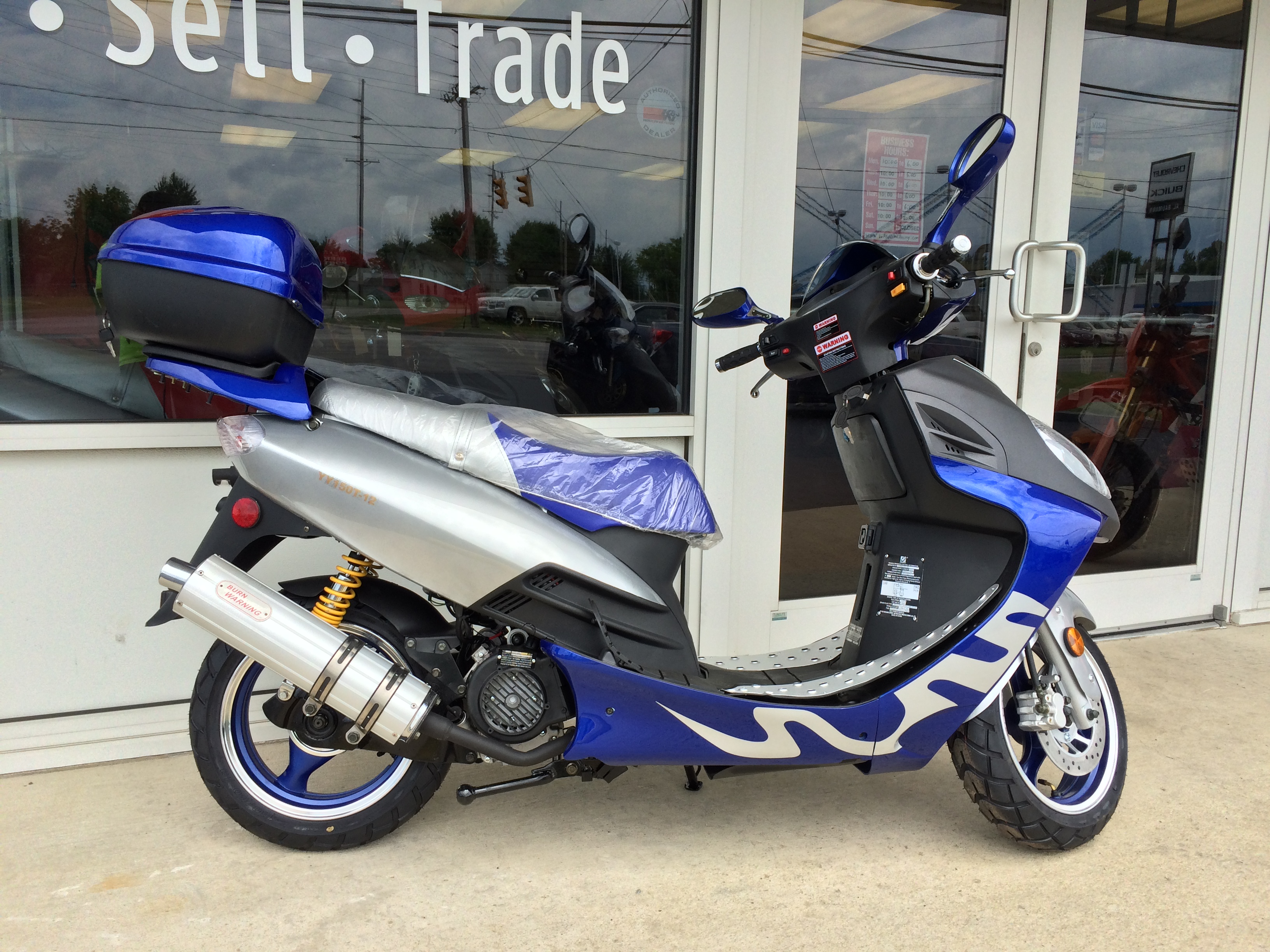 Blue Scooter (Side View) | Redline Racing, LLC